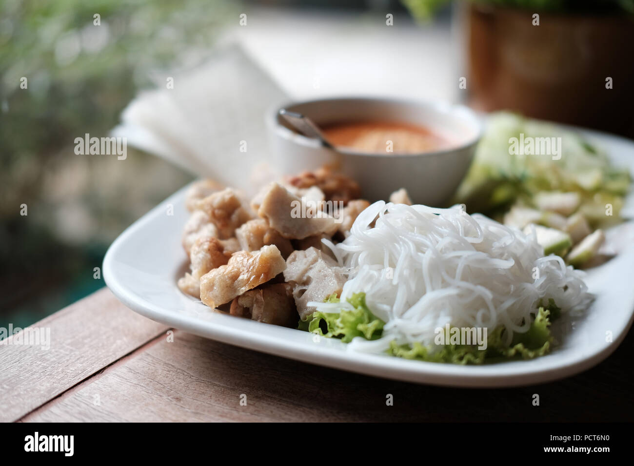 minced pork sausage, fermented rice noodle & vegetable served with ...
