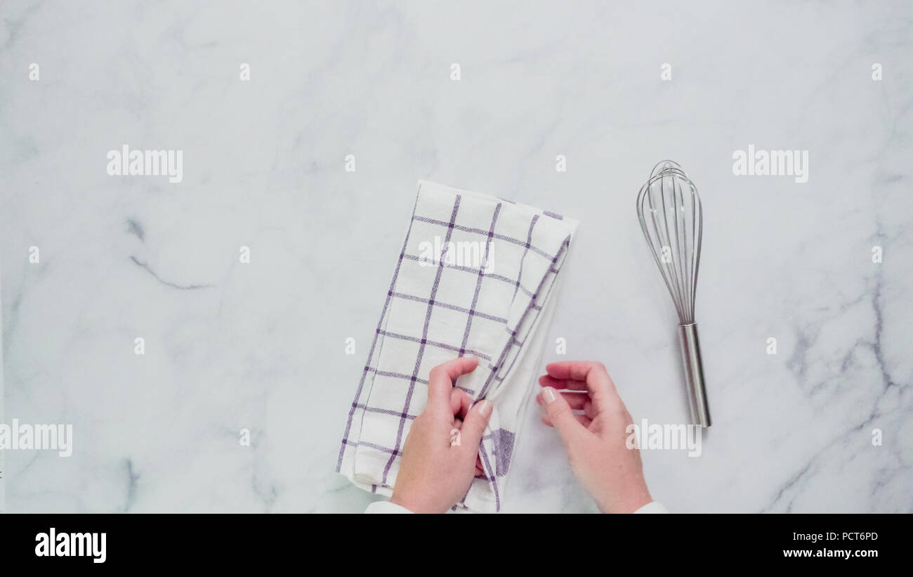 Folding blue and white patterned paper towels on marble surface Stock ...