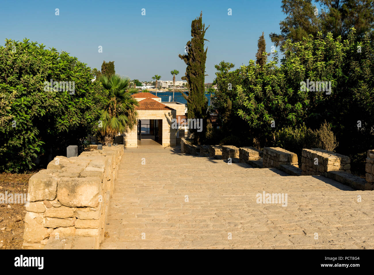 Gate entrance and entry road to Paphos Archaeological Park in Cyprus ...