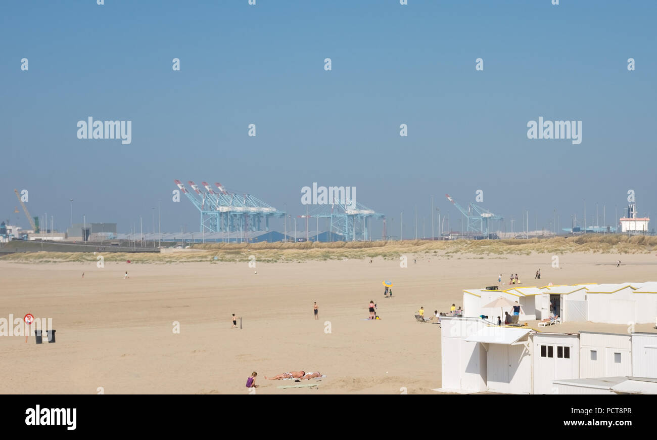 Tourists at the beach of Zeebrugge with port in background Stock Photo ...