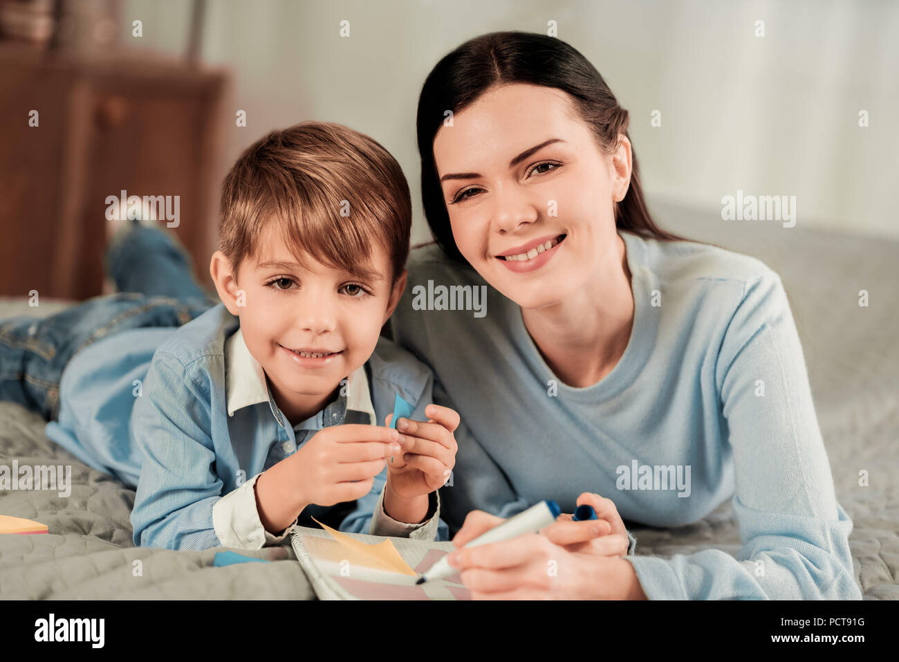 Portrait of positive happy mother and son Stock Photo - Alamy