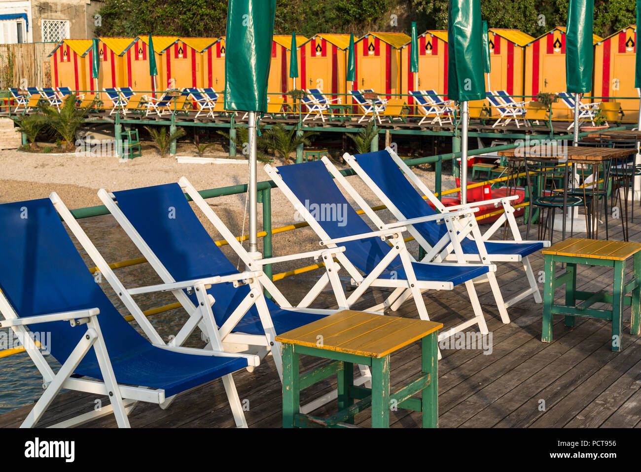 Beach changing rooms and deckchairs, Sorrento, Italy Stock Photo - Alamy