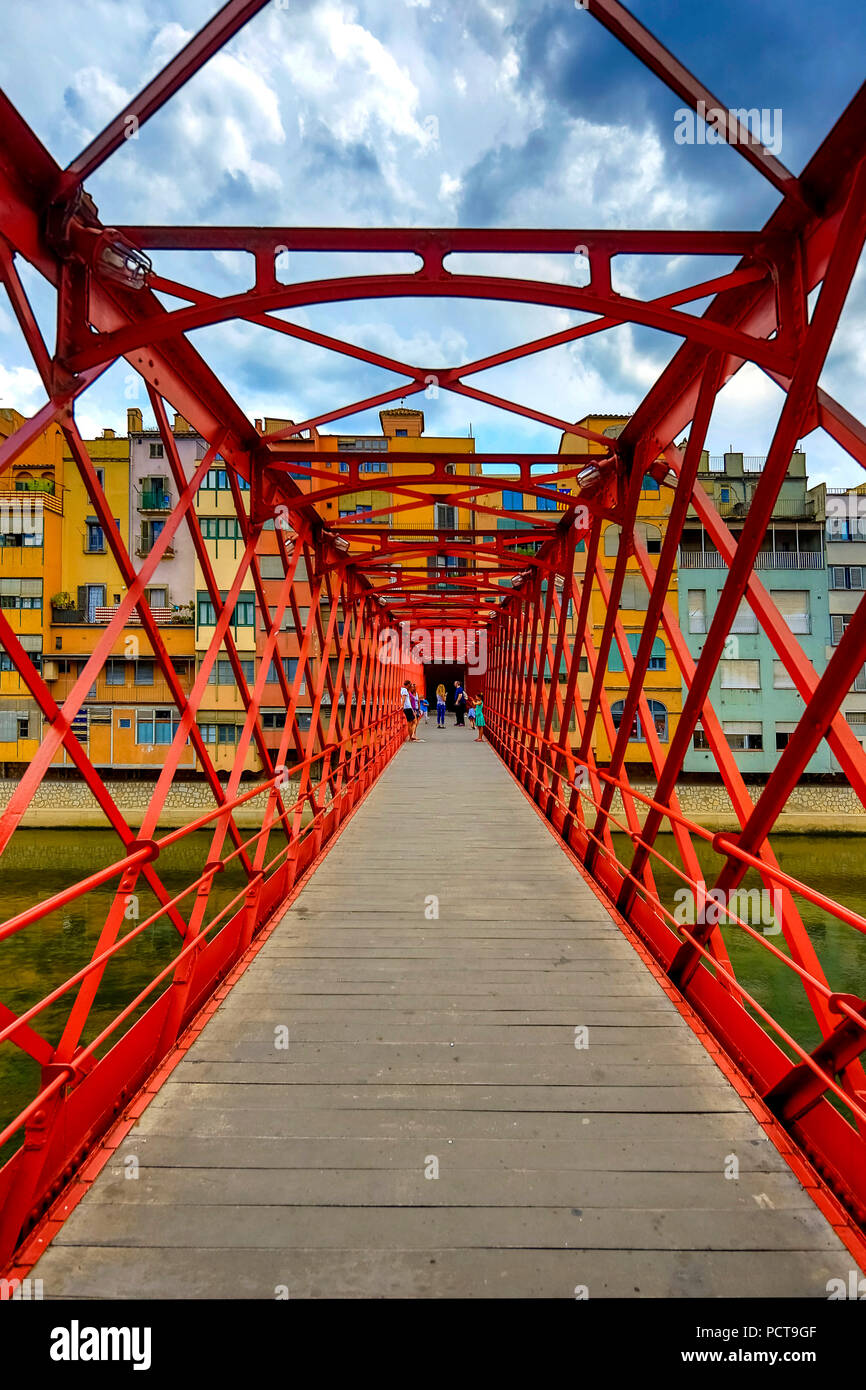 Red bridge over Onyar River built by Eiffel company, Girona, Catalonia ...