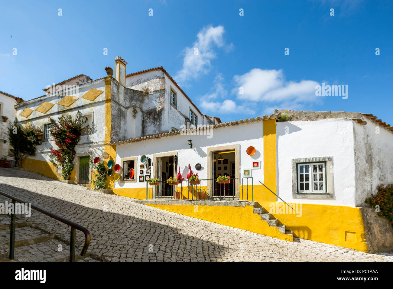 Picturesque alleys within the castle walls, picturesque town Obidos ...