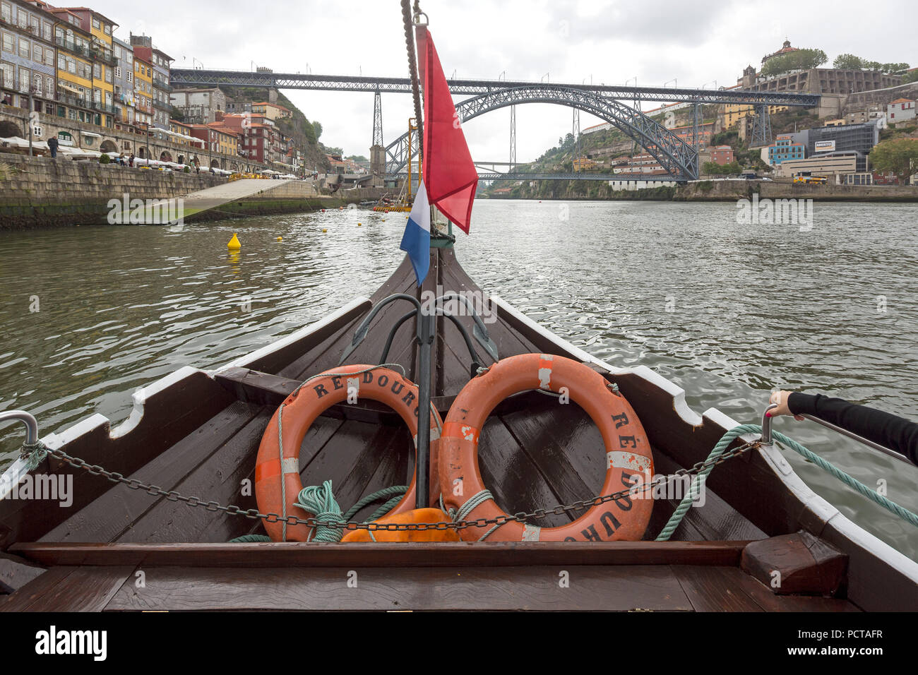 Excursion by boat under the famous bridge of porto hi-res stock ...