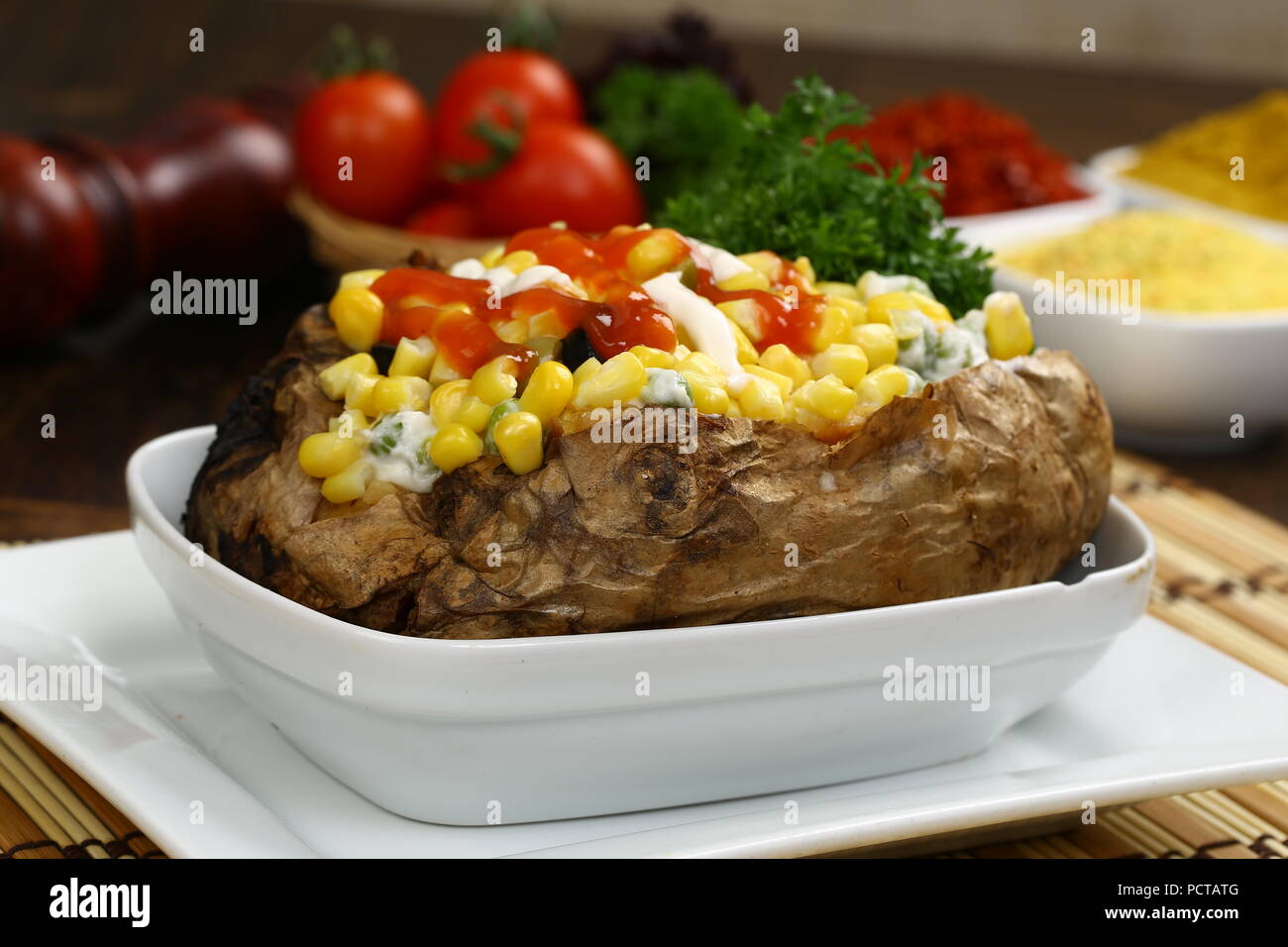 Kumpir, Turkish Baked potato with cheese, corn and sausage Stock Photo ...