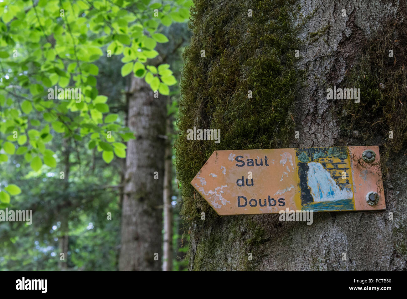 Signpost for the waterfall Saut du Doubs at the Lac des Brenets ...