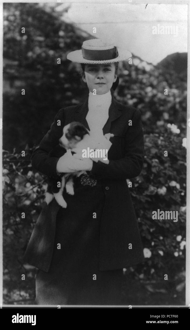 Alice Roosevelt in riding clothes, with dog Stock Photo - Alamy