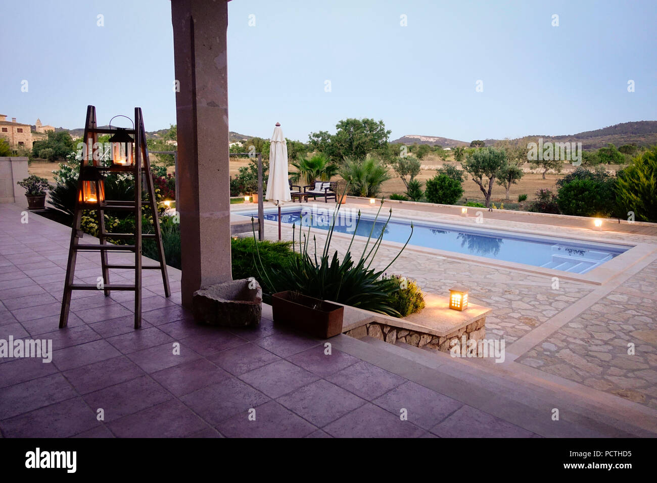 Terrace with pool of a holiday finca and view of the landscape ...