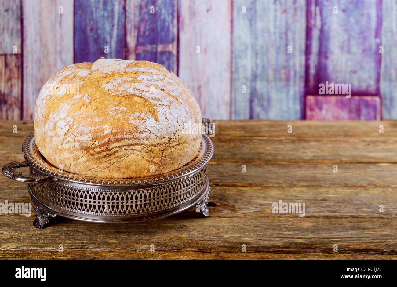 Freshly baked traditional bread of on wooden background, food closeup ...