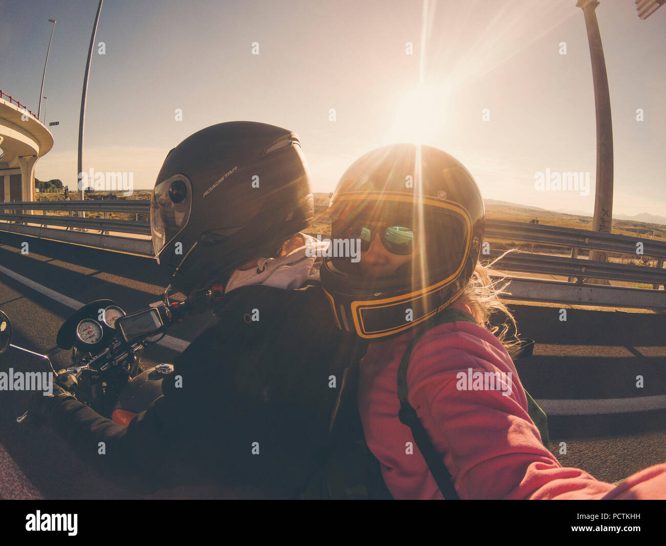 Couple riding motorcycle hi-res stock photography and images - Alamy
