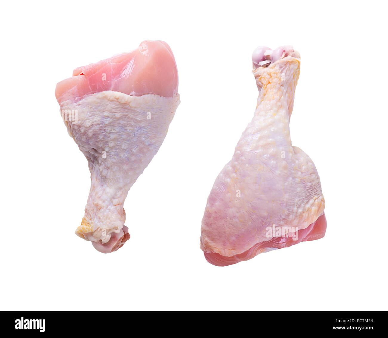 Raw chicken legs isolated on white background Stock Photo - Alamy