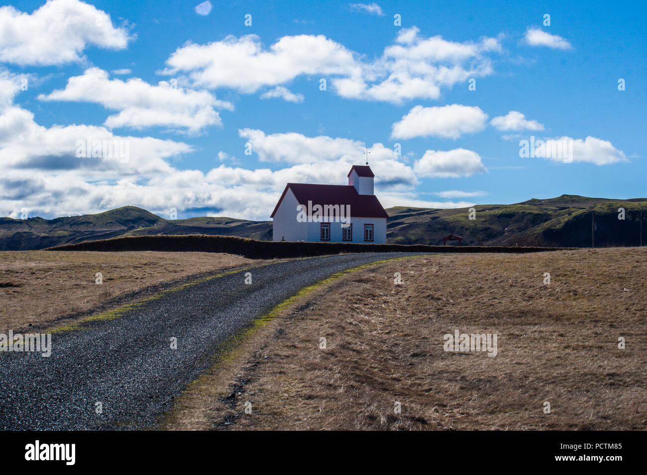 Old style church on Iceland landscape background. White building with ...