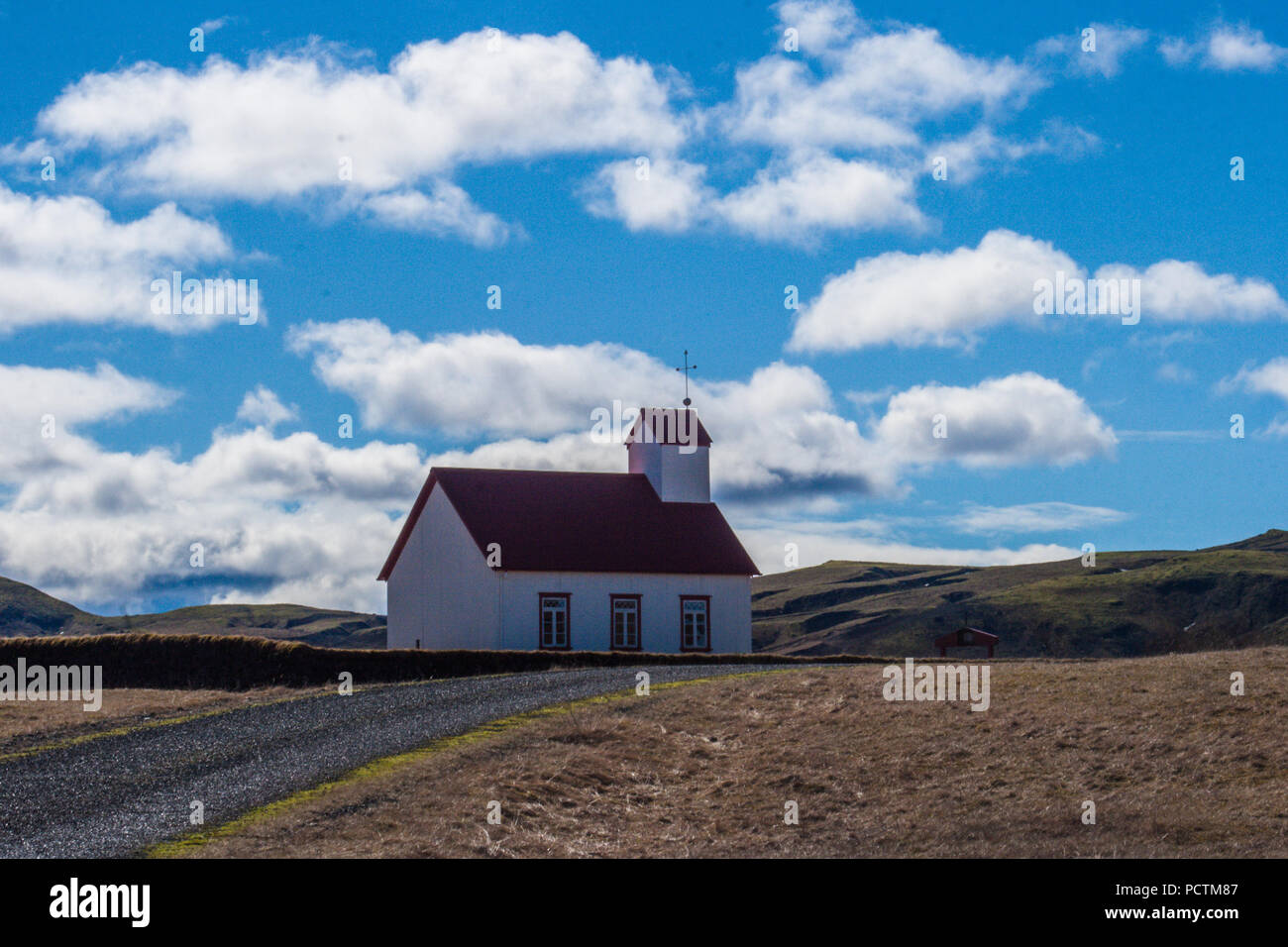 Old style church on Iceland landscape background. White building with ...