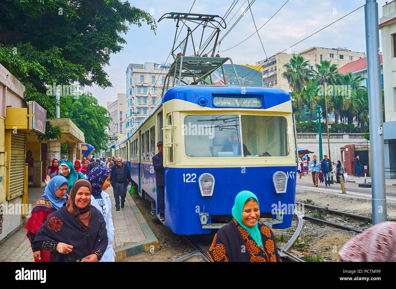 ALEXANDRIA, EGYPT - DECEMBER 18, 2017: The crowd on a tram station at ...
