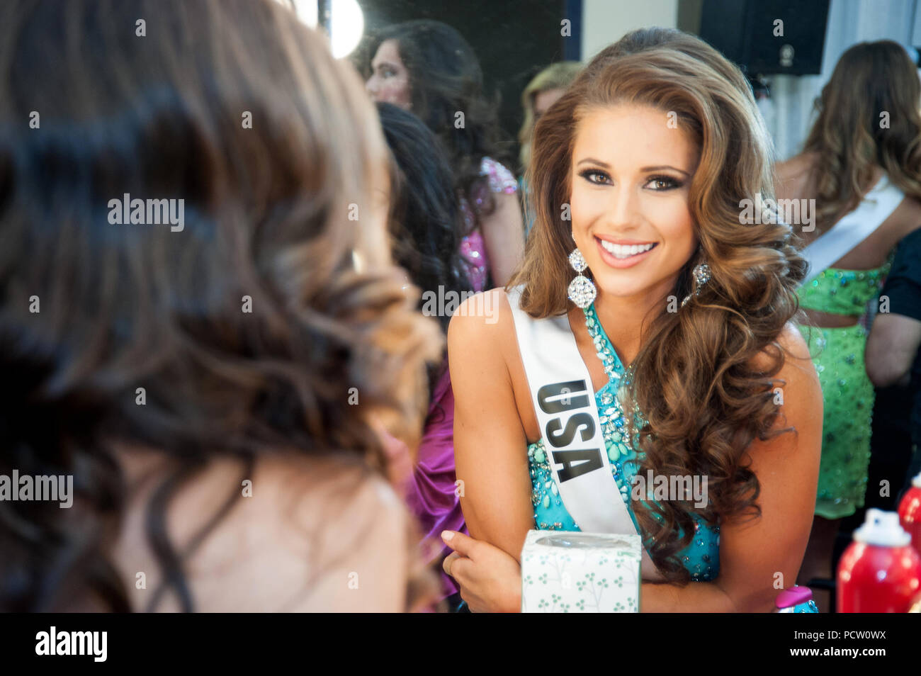 DORAL, FL - JANUARY 25: Nia Sanchez, Miss USA 2014 gets her makeup done ...