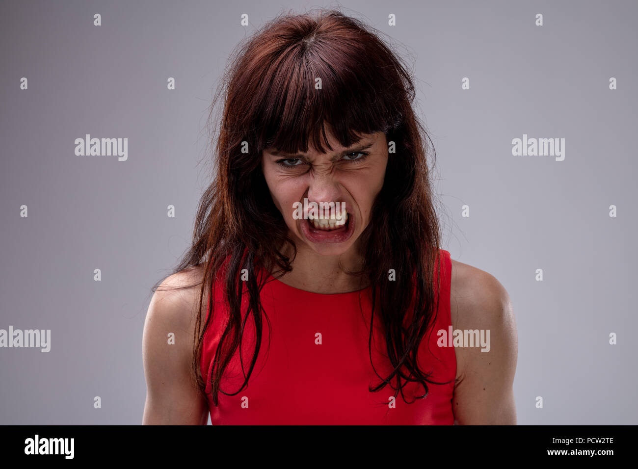 Woman snarling hi-res stock photography and images - Alamy