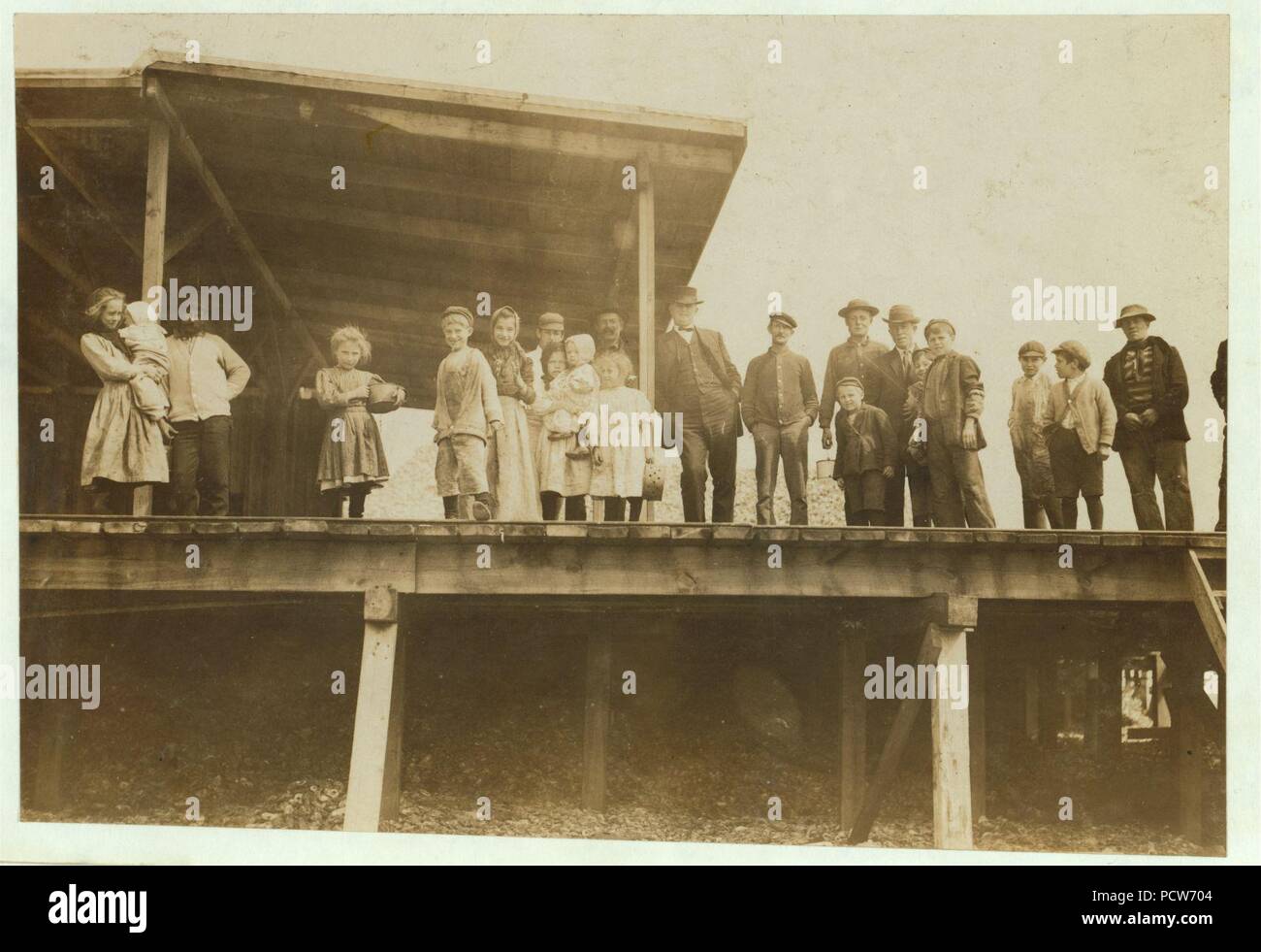 All these children were shucking oysters and tending babies at the Pass ...
