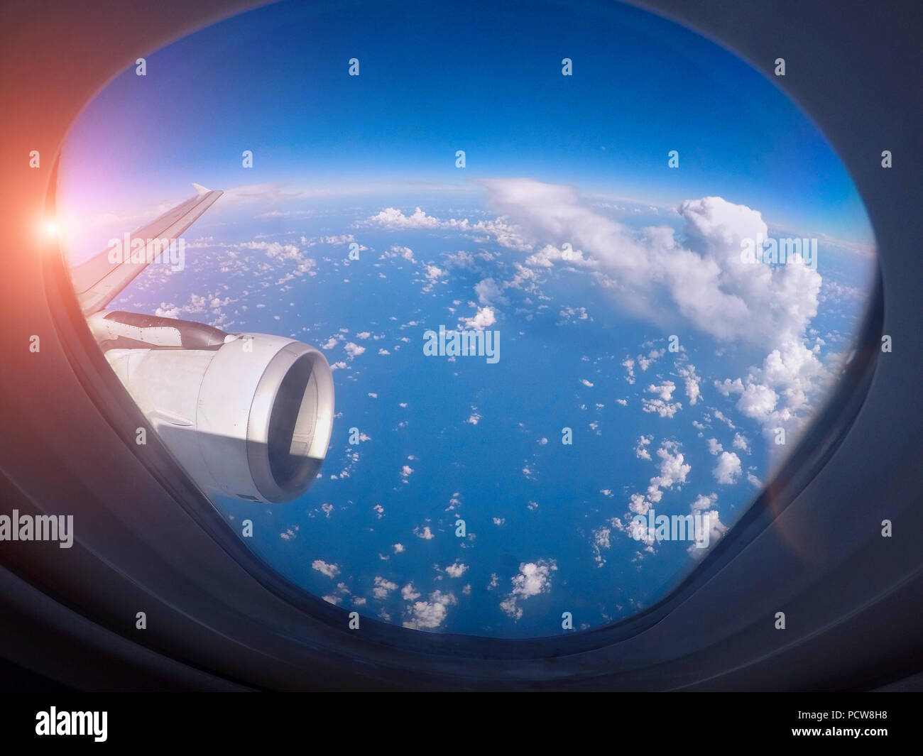 Classic image through aircraft window onto jet engine Stock Photo - Alamy