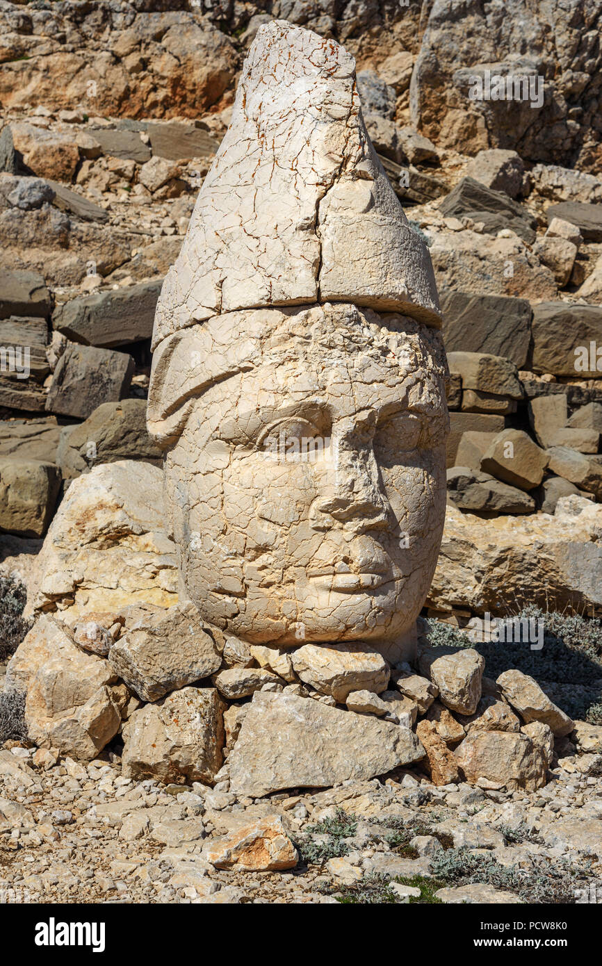 Antiochos statue at East Terrace on top of Nemrut Mountain. Stone heads ...