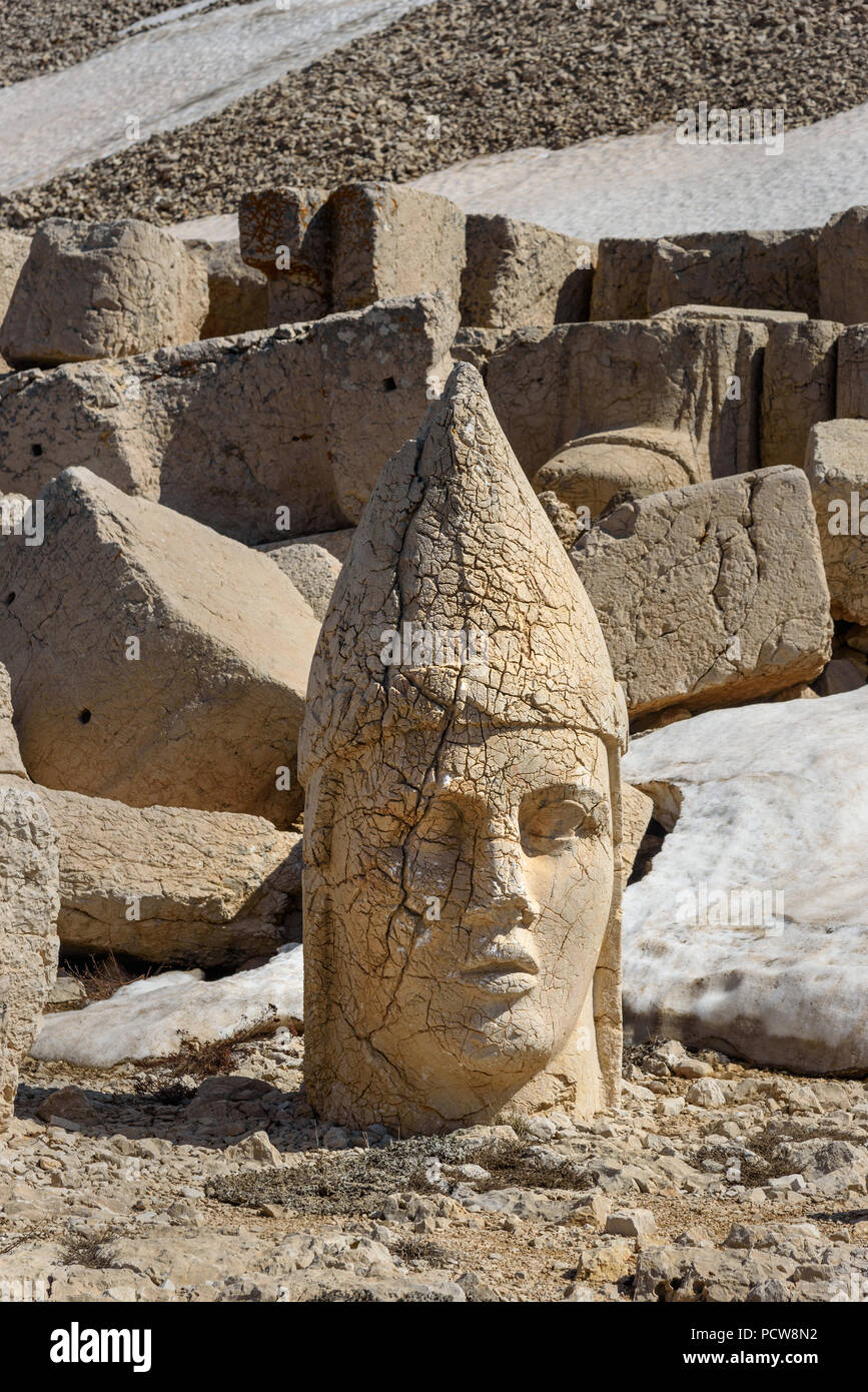 Apollo statue at West Terrace on top of Nemrut Mountain. Stone heads at ...