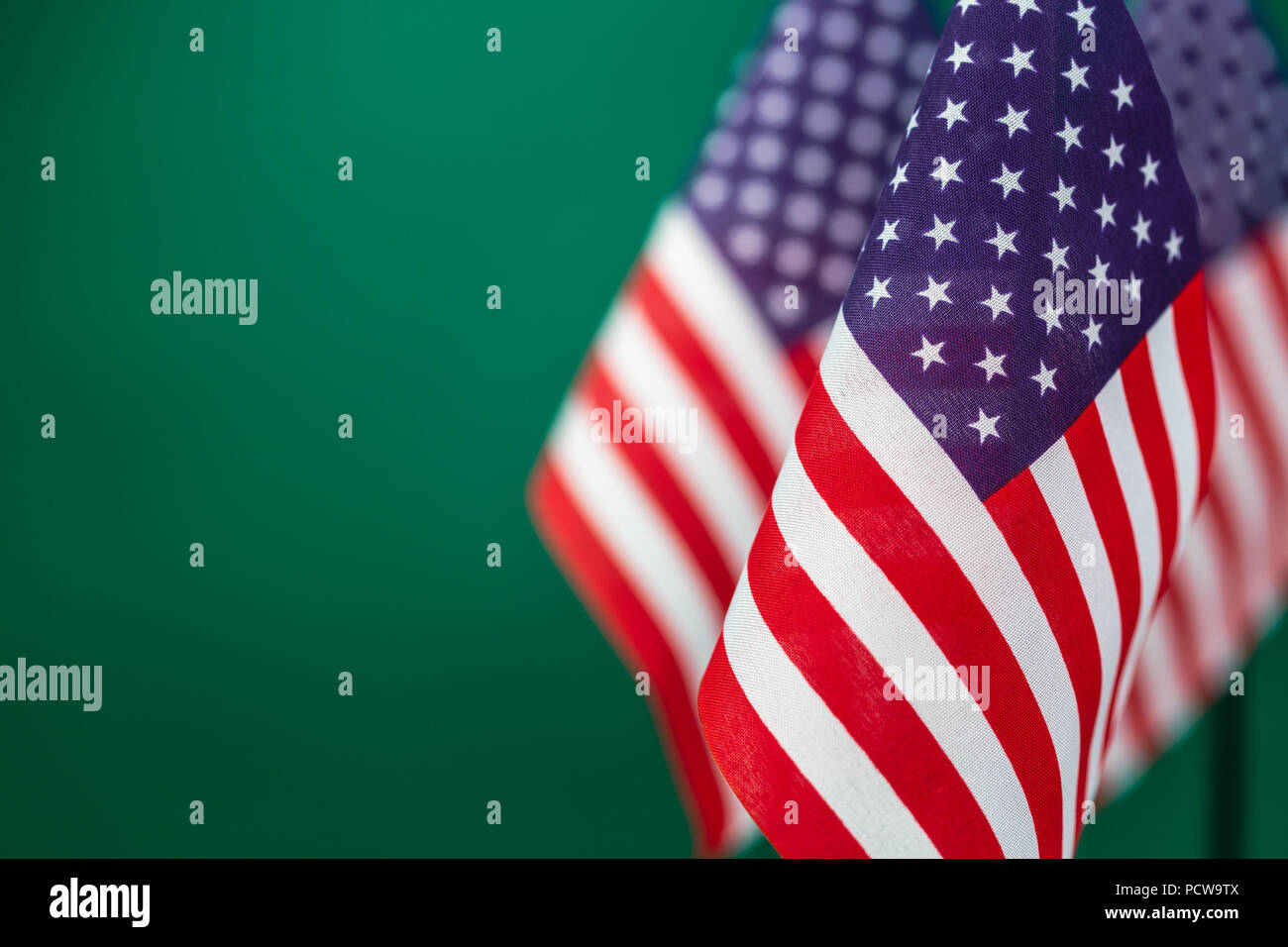Flags United States of America with green background empty space for ...