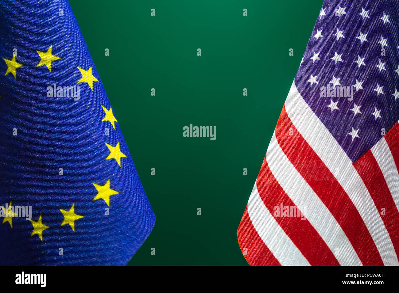 Flags United State of America and United Europe with green background ...