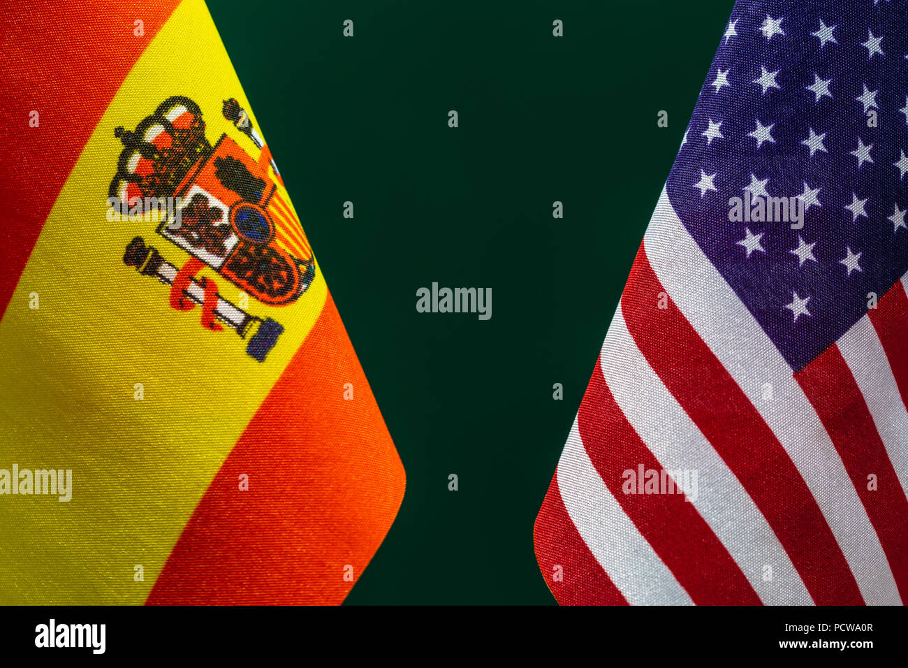 Flags United State of America and Spain with green background. Concept ...