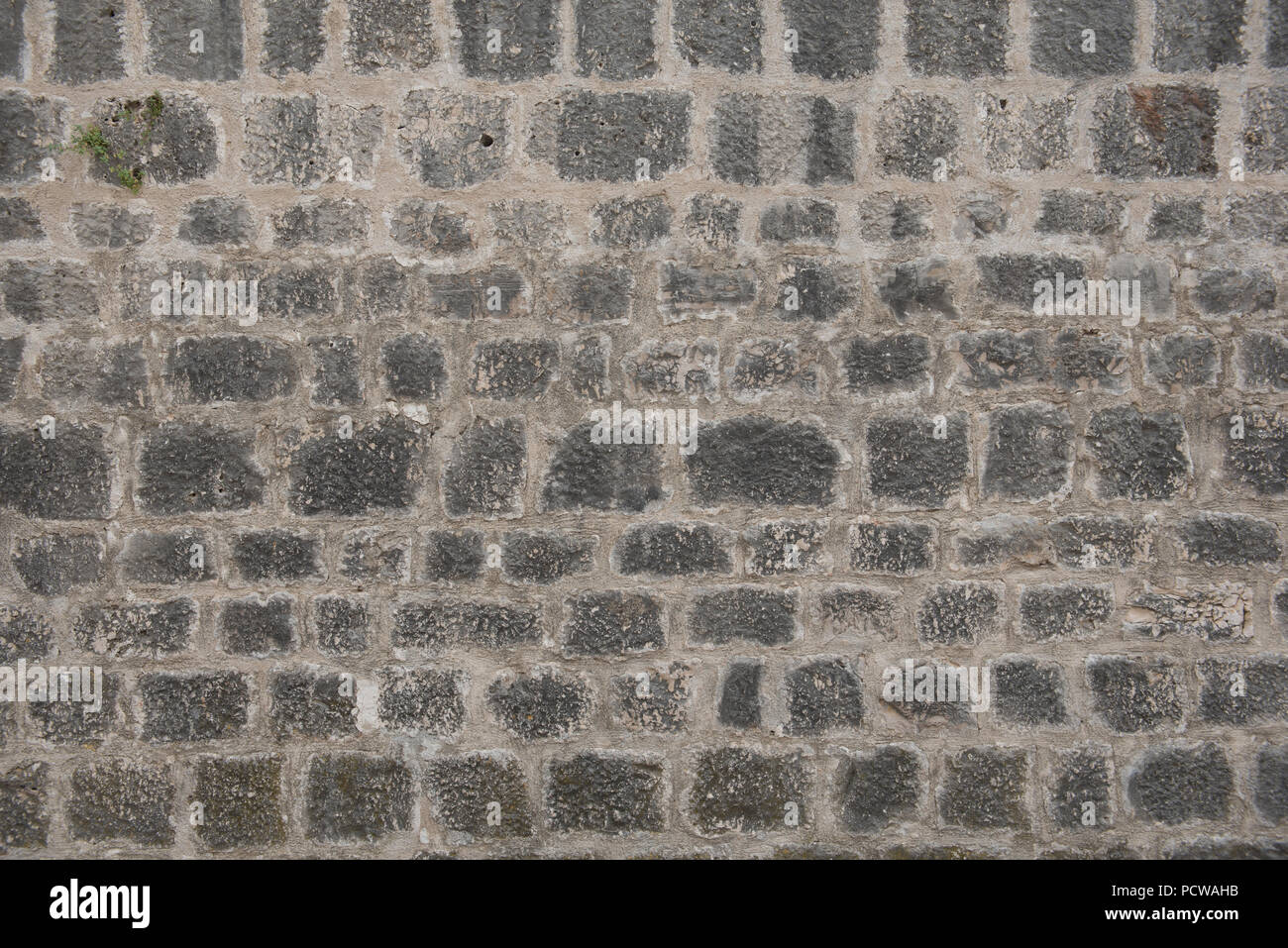 Old grey stone wall, building as background, wallpaper Stock Photo - Alamy