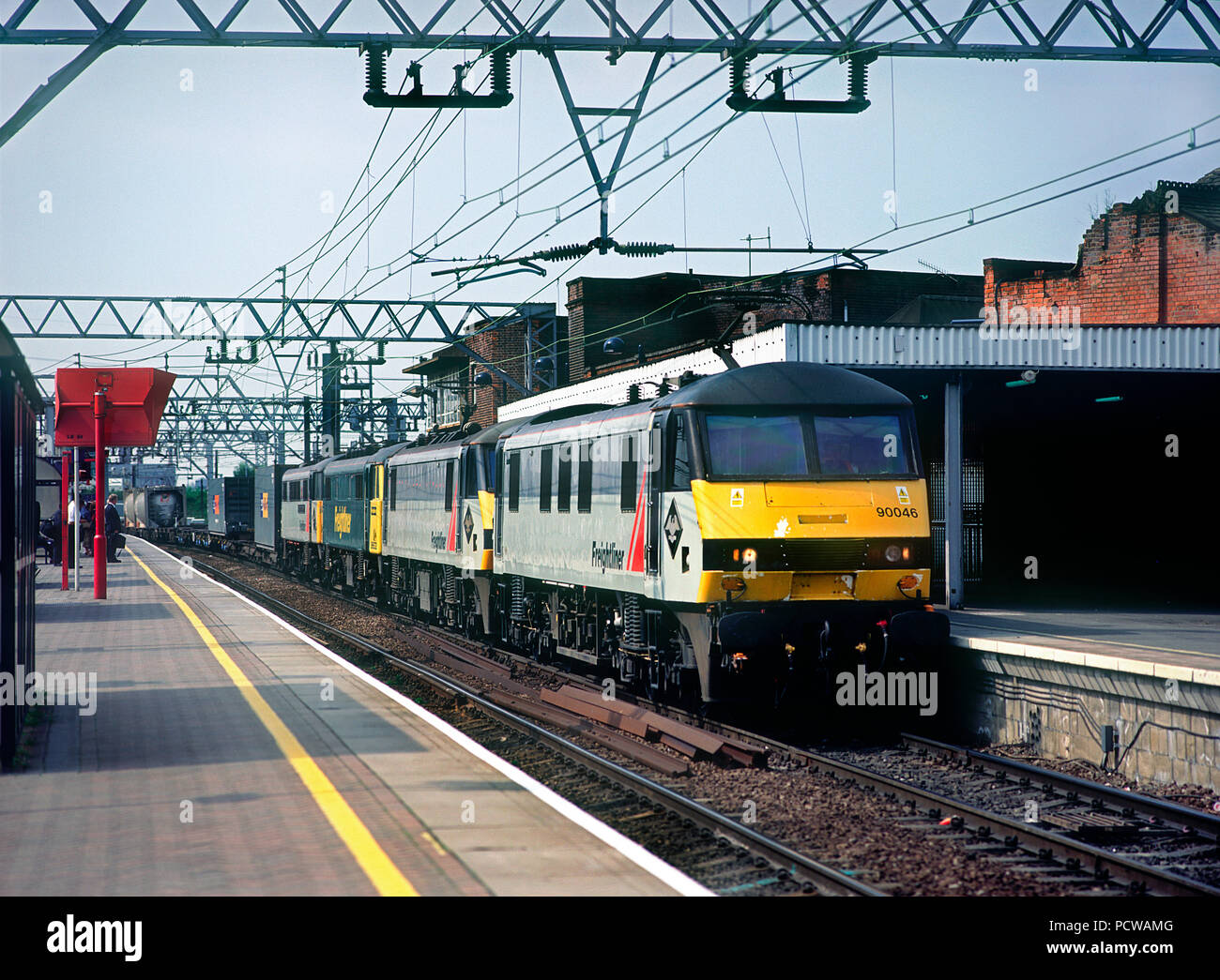 A pair of class 90 electric locomotives numbers 90046 and 90045 with a ...