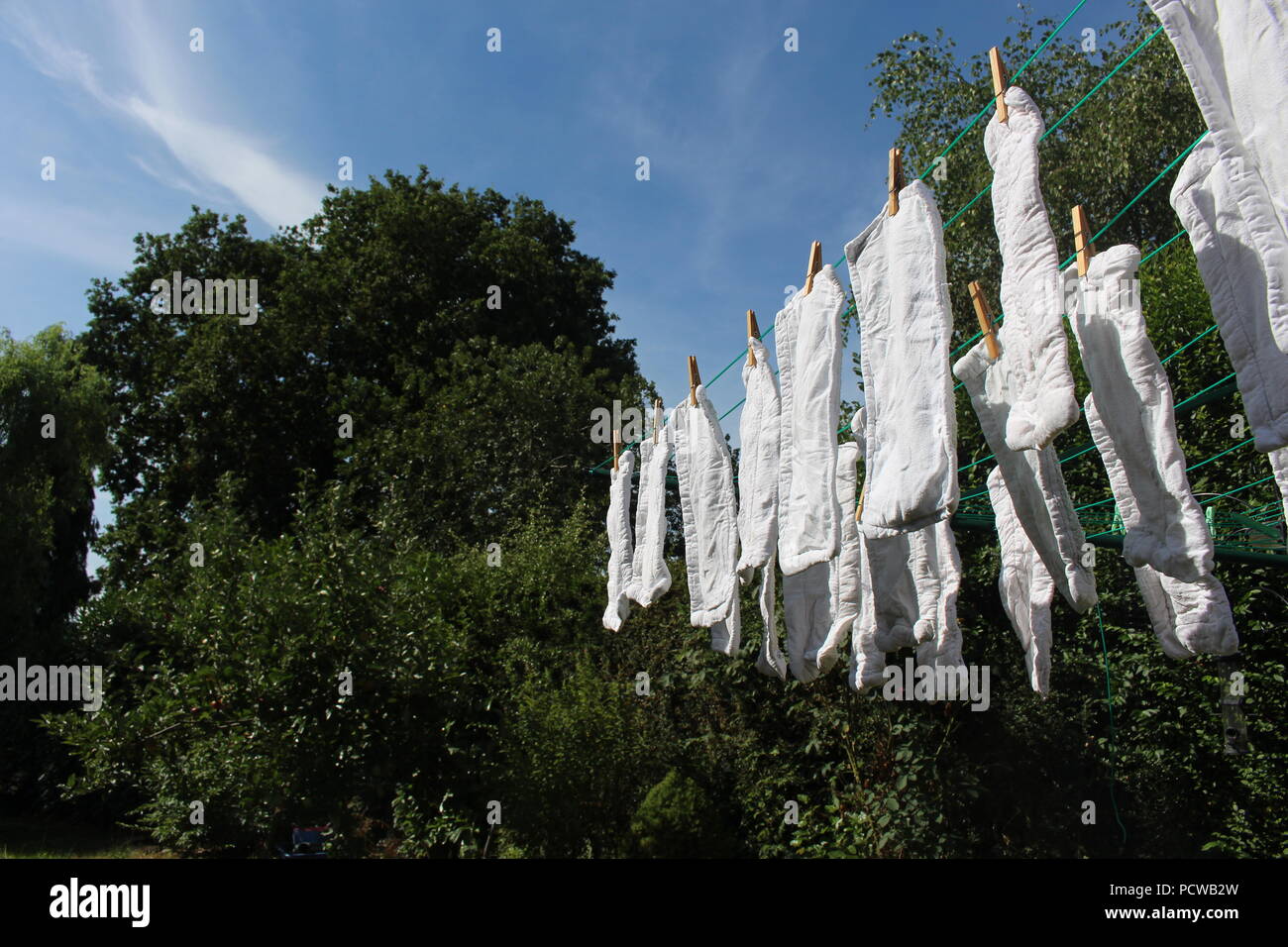 Environmentally friendly nappy inserts drying on a washing line Stock ...