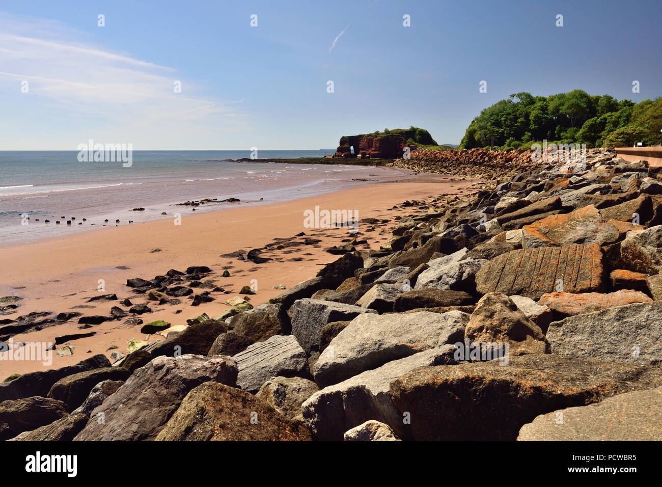 Dawlish Warren beach near Langstone Rock, showing rock armour along the ...