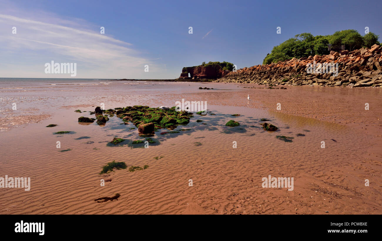 Dawlish Warren beach near Langstone Rock, showing rock armour along the ...