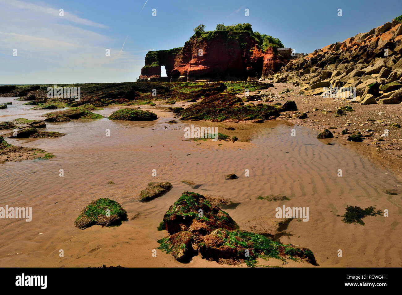 Dawlish Warren beach near Langstone Rock, showing rock armour along the ...