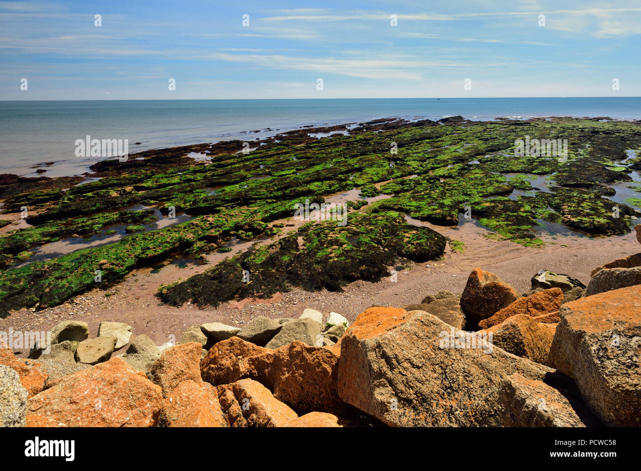 Rock armour sea wall beach hi-res stock photography and images - Alamy