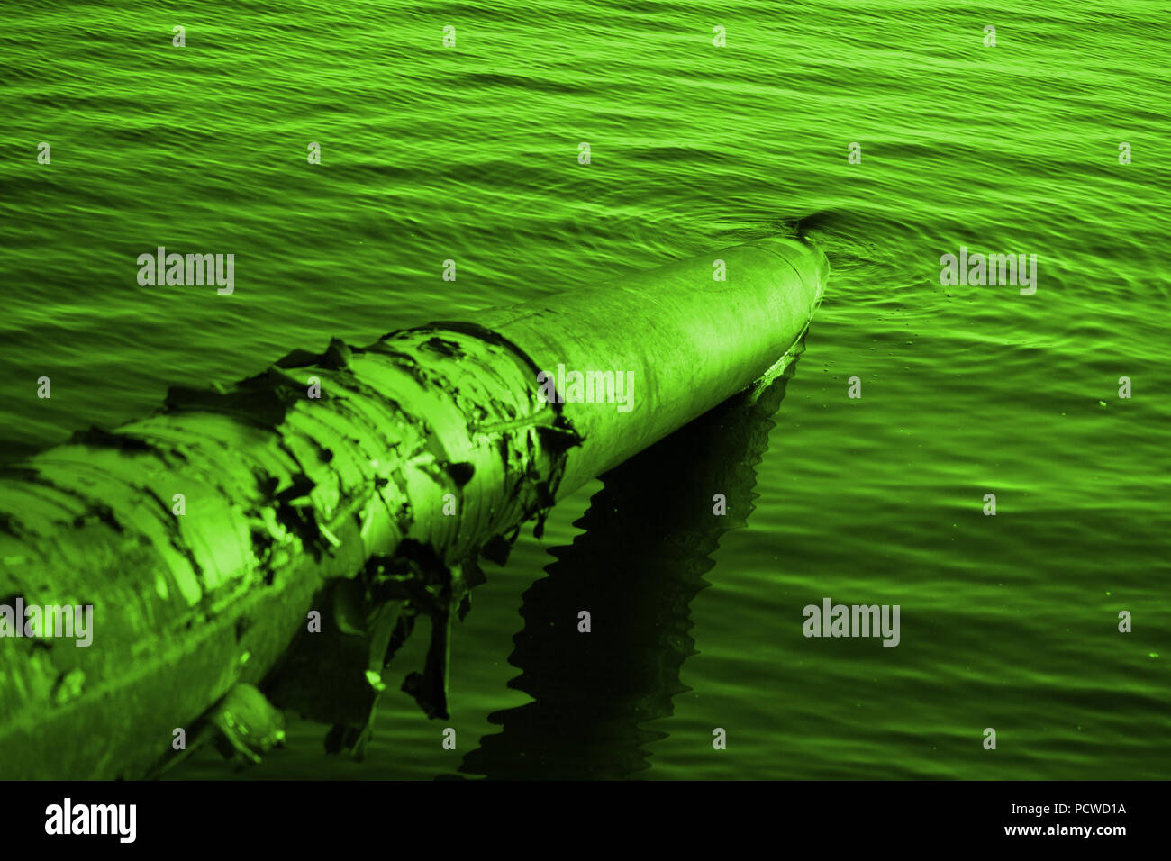 water pollution concept. pipe and toxic green color water Stock Photo ...