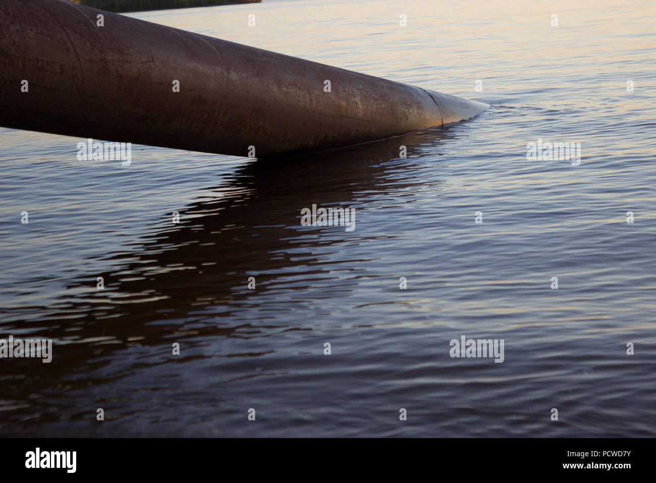 water pollution concept. pipe and toxic green color water Stock Photo ...