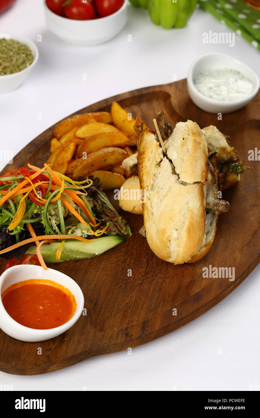 Philly beef steak cheese submarine sandwich Stock Photo - Alamy