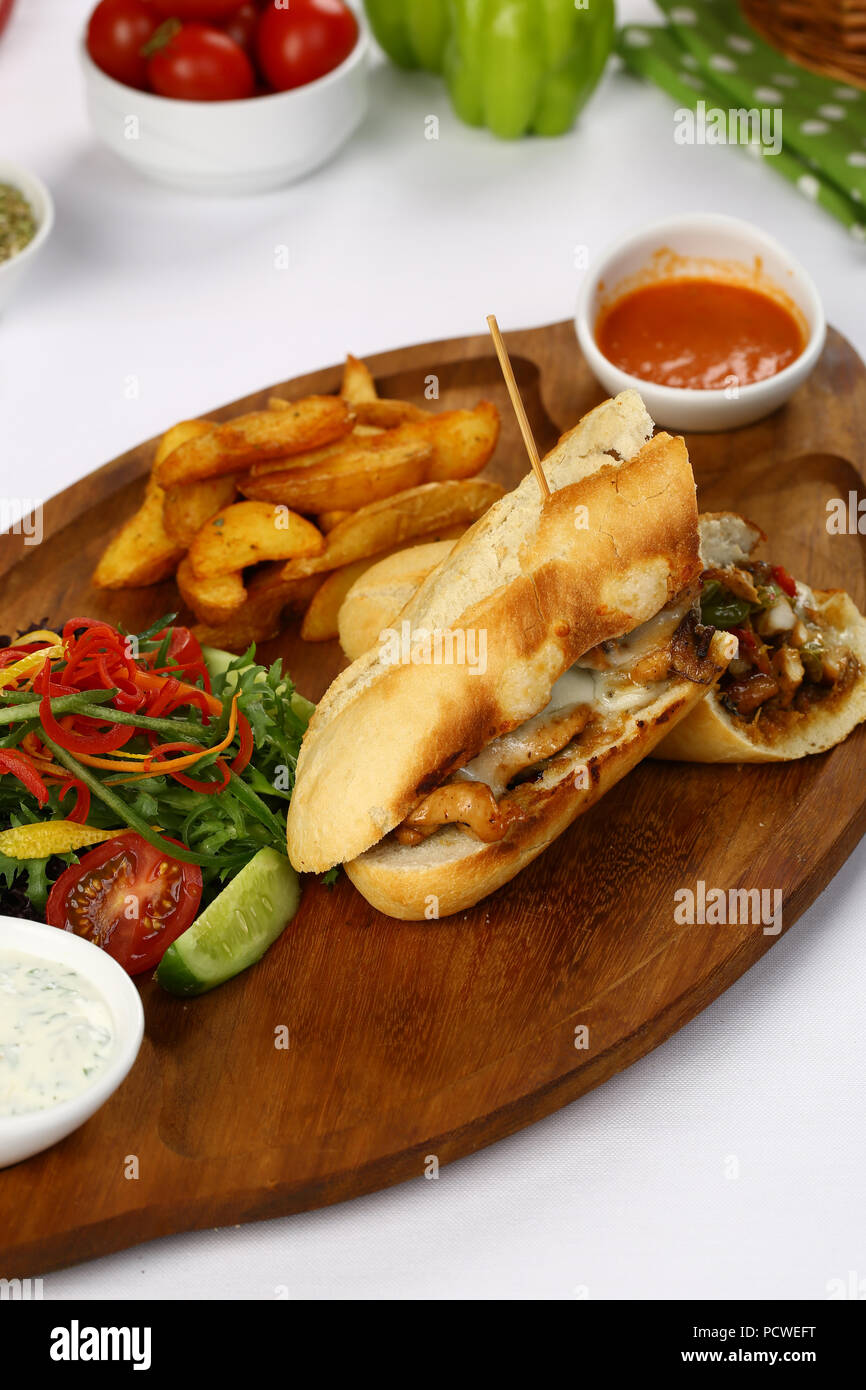 Philly beef steak cheese submarine sandwich Stock Photo - Alamy