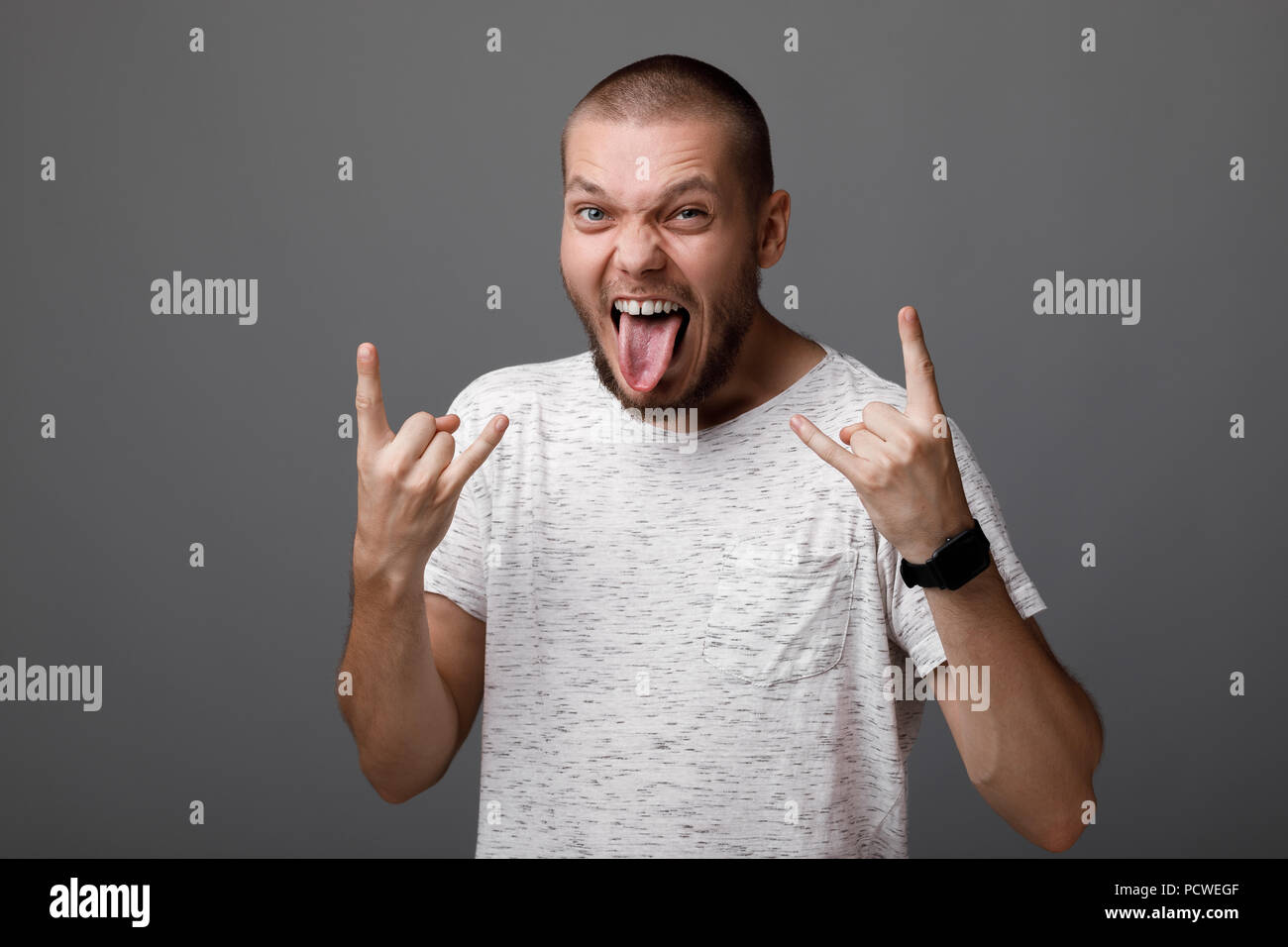 Angry excited young bearded man hi-res stock photography and images - Alamy