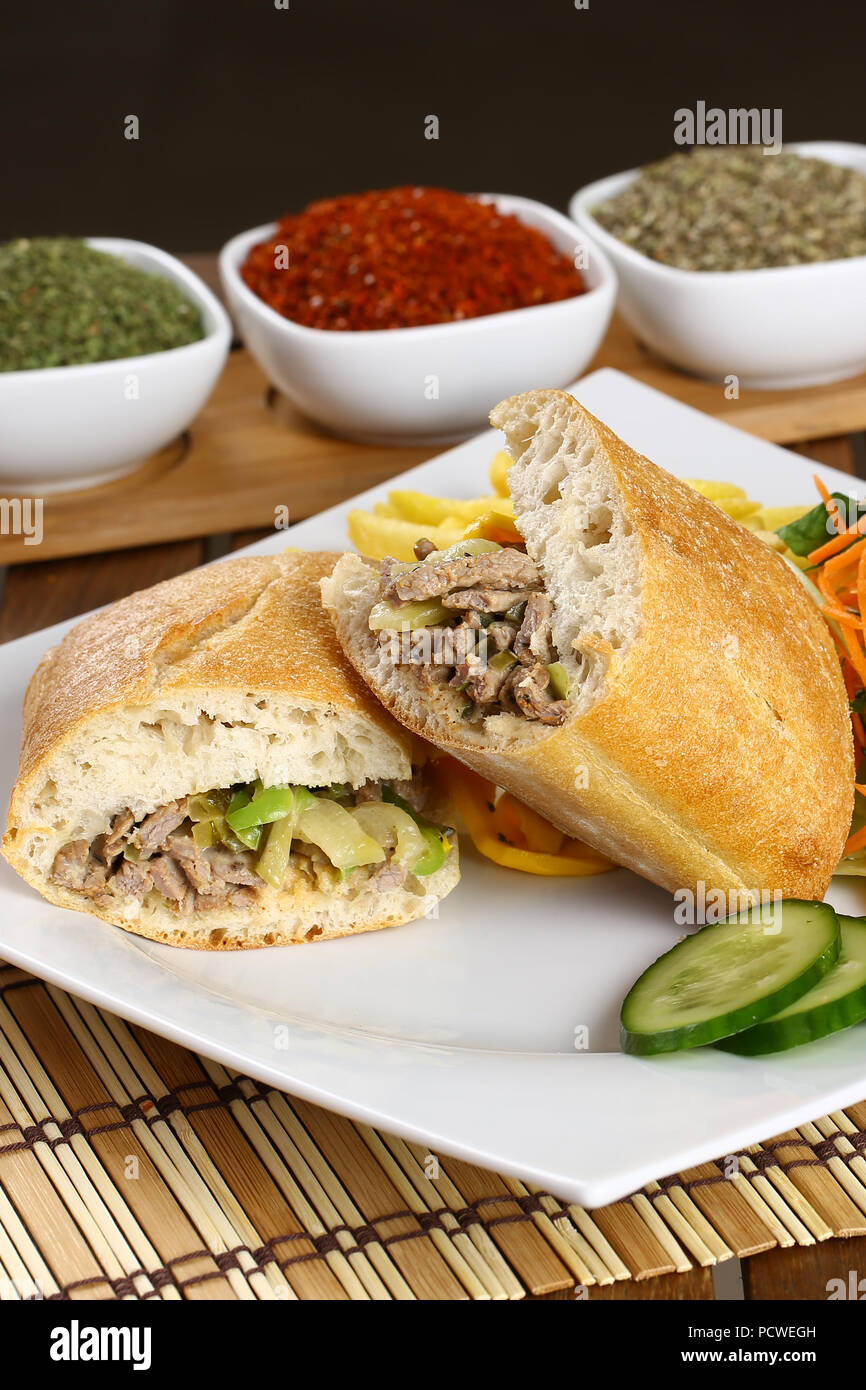 Philly beef steak cheese submarine sandwich Stock Photo - Alamy