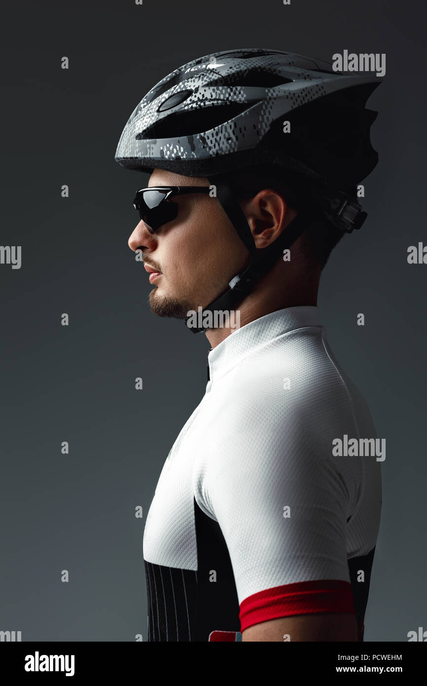 portrait of the cyclist wearing the helmet Stock Photo - Alamy