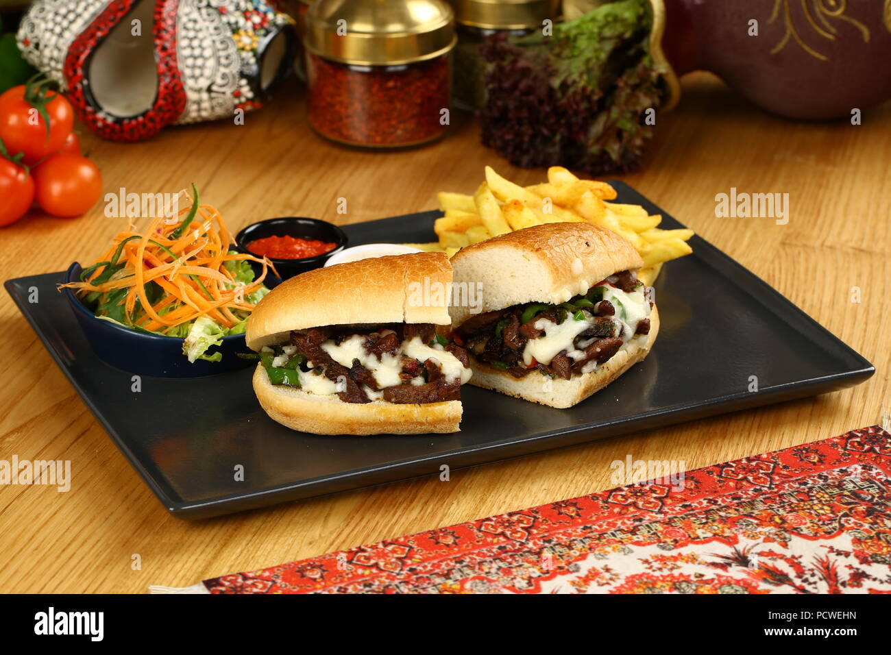Philly beef steak cheese submarine sandwich Stock Photo - Alamy