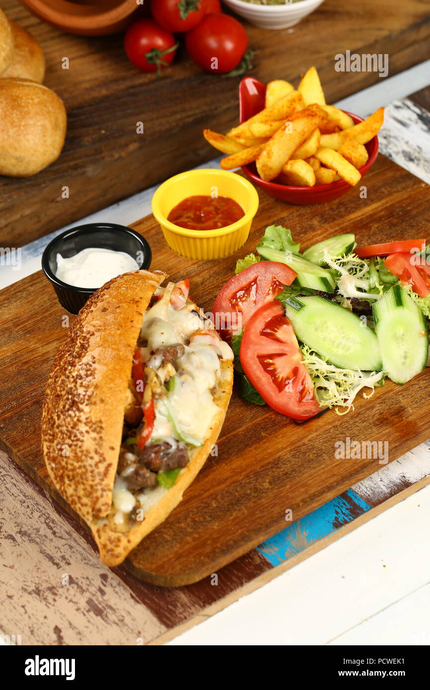 Philly beef steak cheese submarine sandwich Stock Photo - Alamy