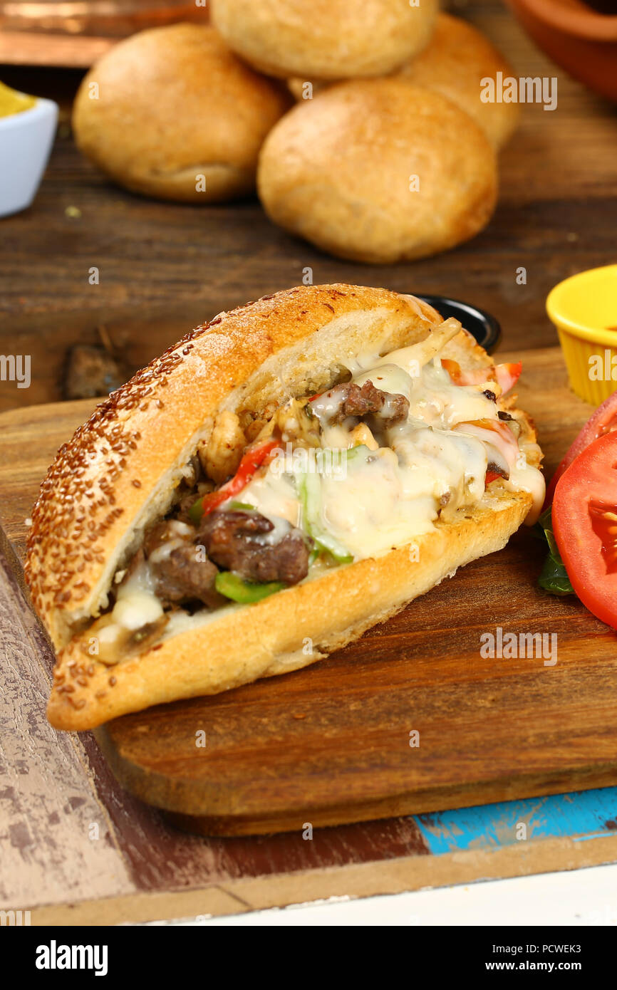 Philly beef steak cheese submarine sandwich Stock Photo - Alamy