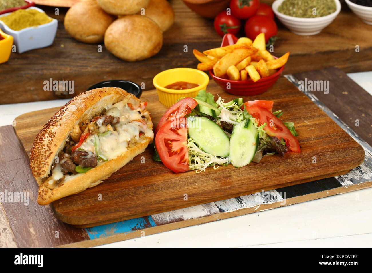 Philly beef steak cheese submarine sandwich Stock Photo - Alamy