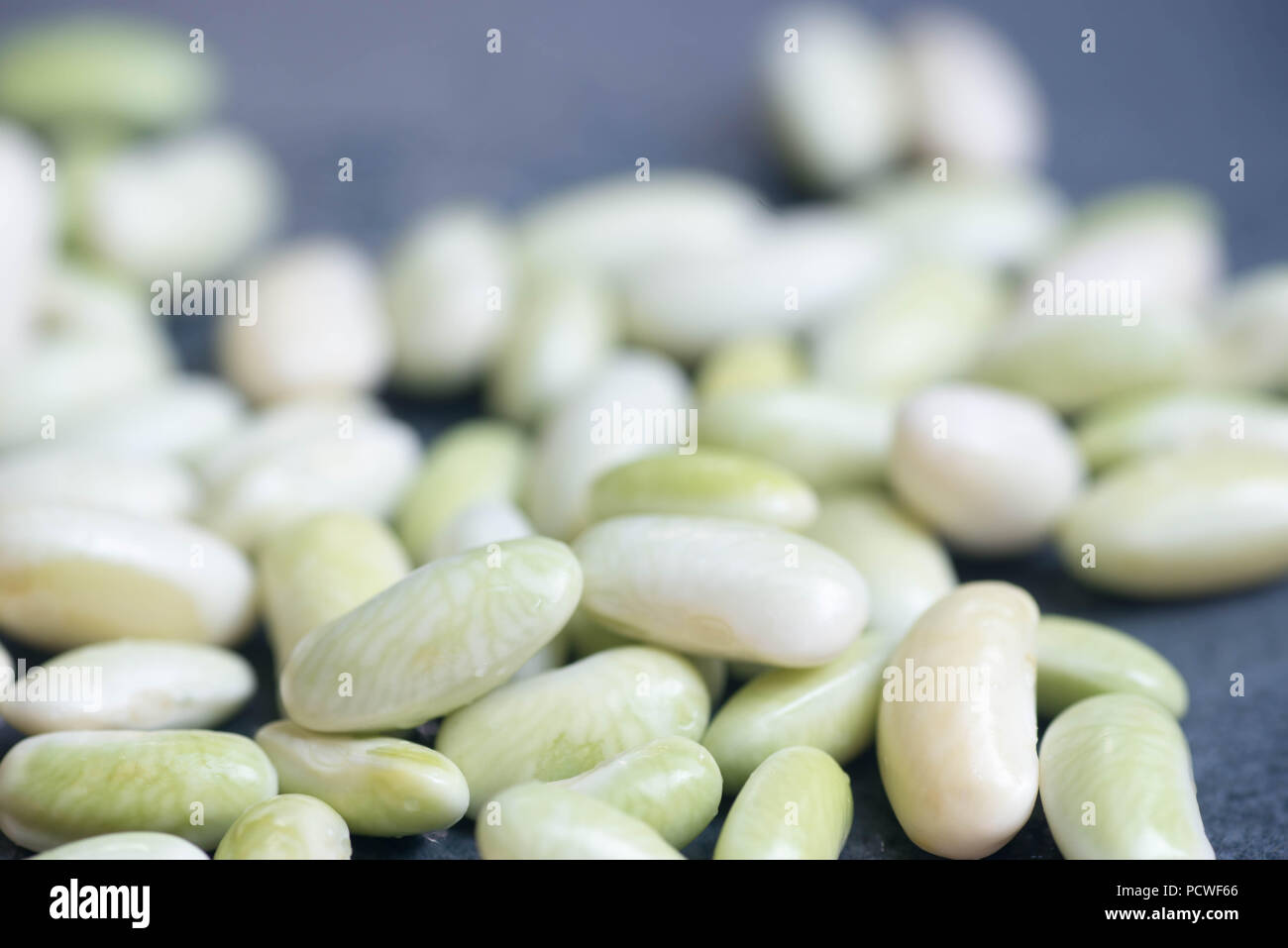 fresh white kidney beans macro on table Stock Photo - Alamy