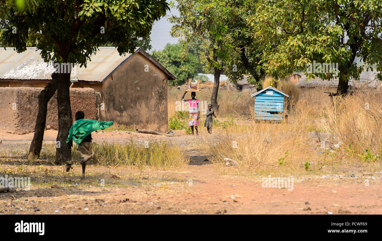 GHANI, GHANA - JAN 14, 2017: Unidentified Ghanaian little boy runs in a ...