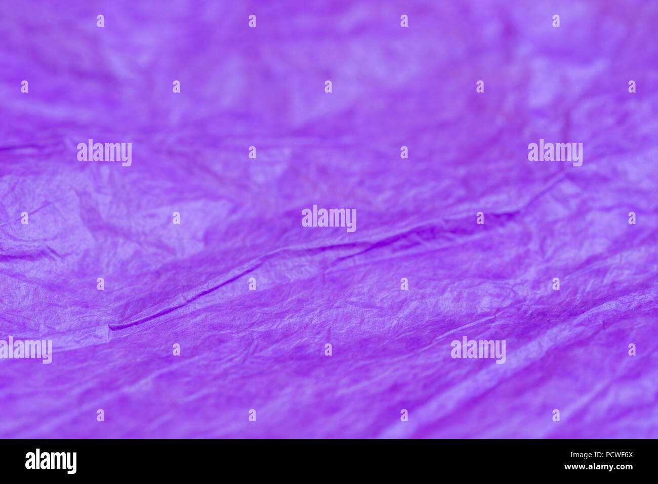 violet color creased paper tissue texture background Stock Photo - Alamy