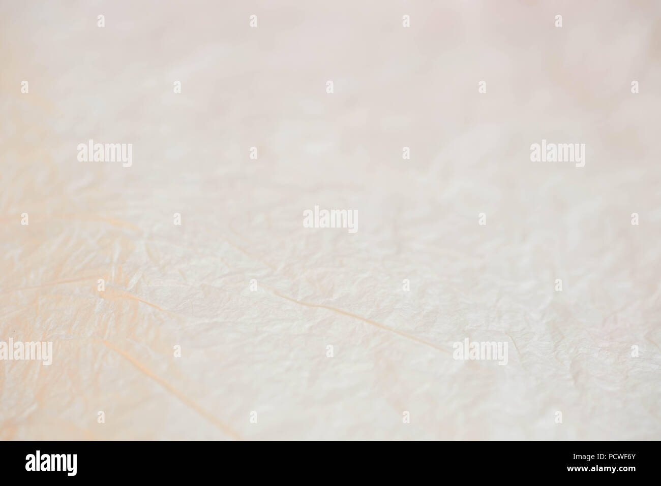 beige color creased paper tissue texture background Stock Photo - Alamy